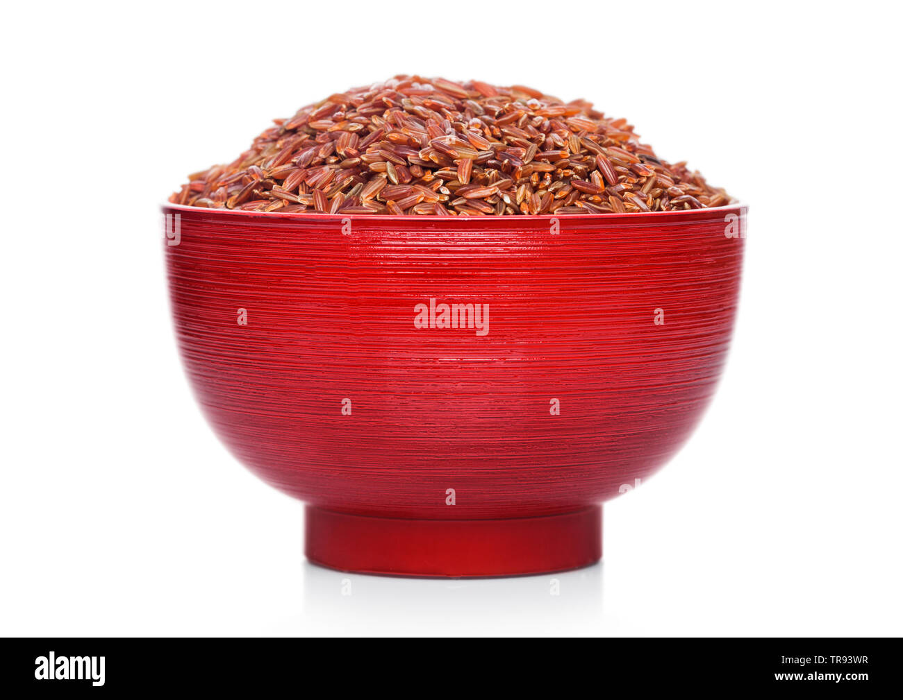 Red bowl of raw organic red rice on white background Stock Photo - Alamy