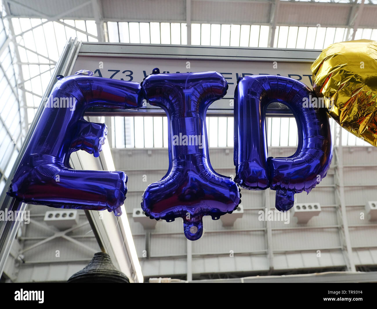 Helium balloons spelling out the word Eid Stock Photo - Alamy