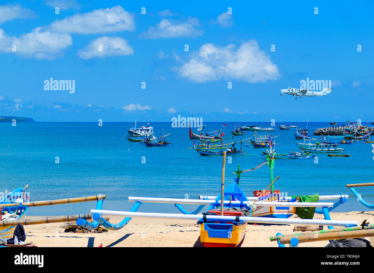 Traditional colorful fishing boats in the harbor of Balinese fishing ...