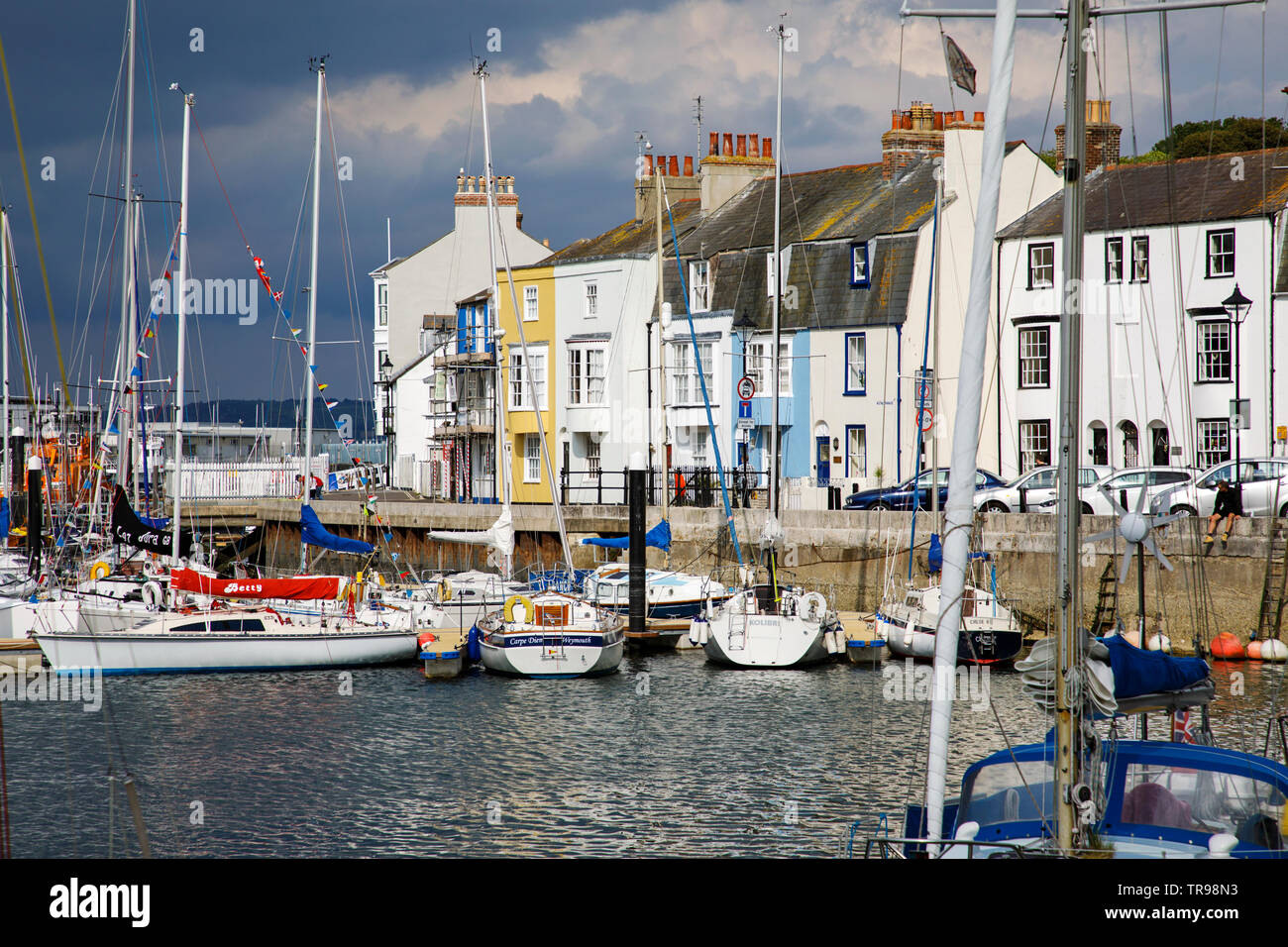 WEYMOUTH, UK - MAY 20th, 2019: Old harbour is a picturesque area at the ...