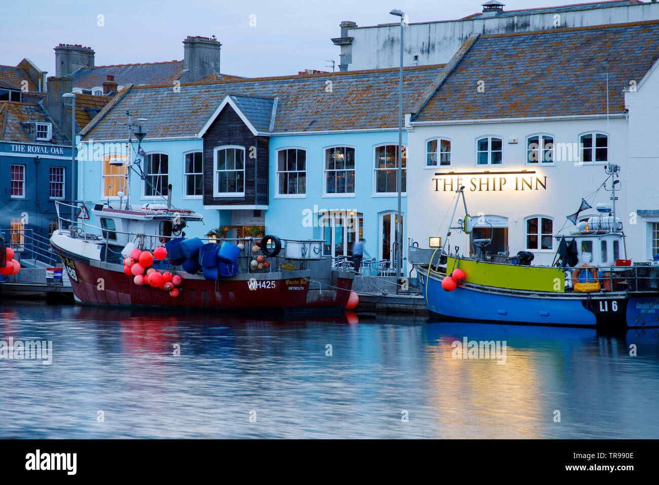 WEYMOUTH, UK - MAY 20th, 2019: Old harbour is a picturesque harbour at ...