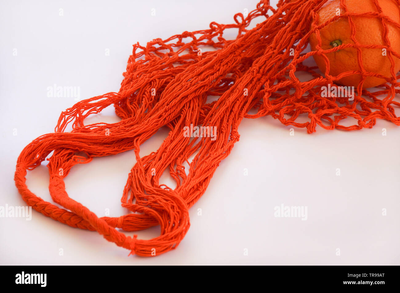 Orange string bag hi-res stock photography and images - Alamy