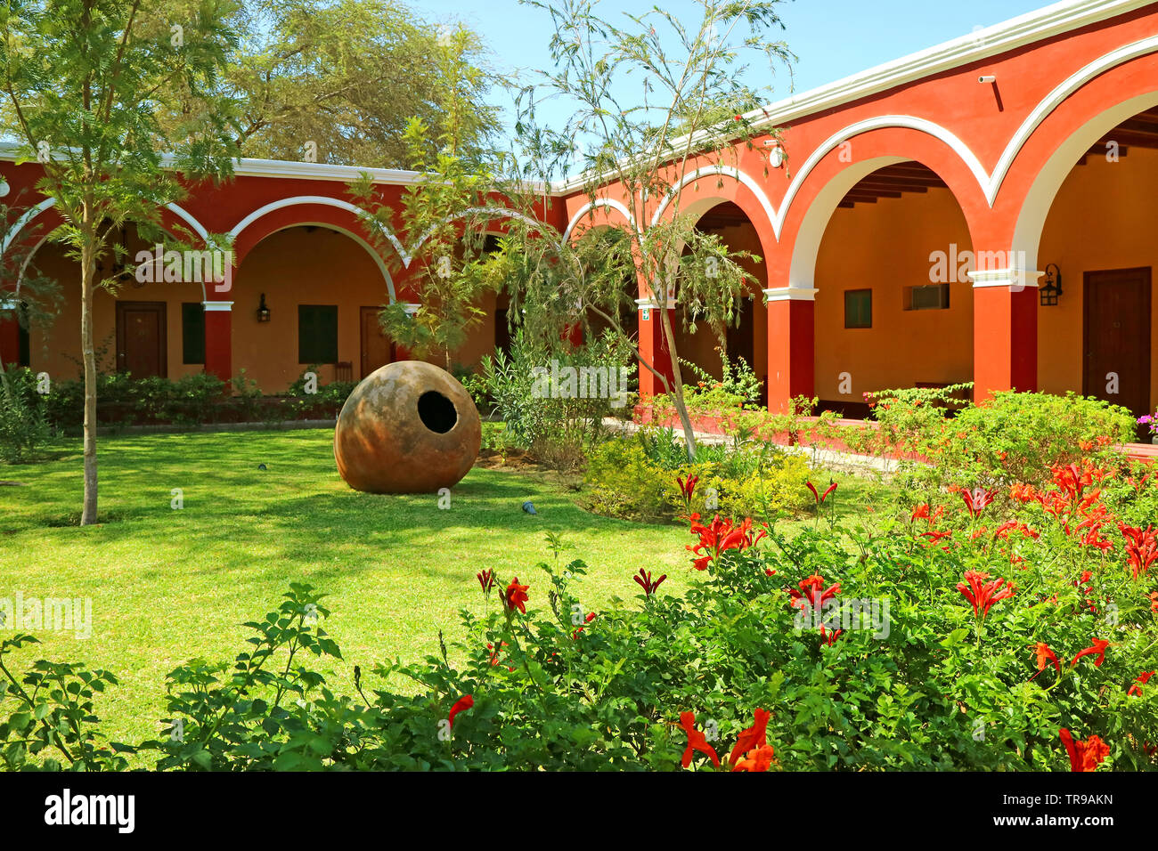 Ornamental Peruvian Garden Inside Beautiful Red and White Hallway ...