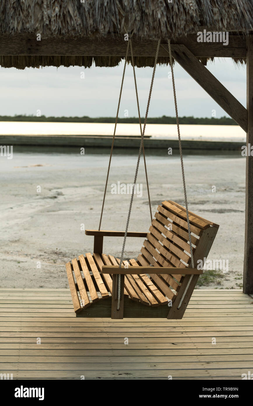 Chair Swing on the beach, Belize Stock Photo - Alamy