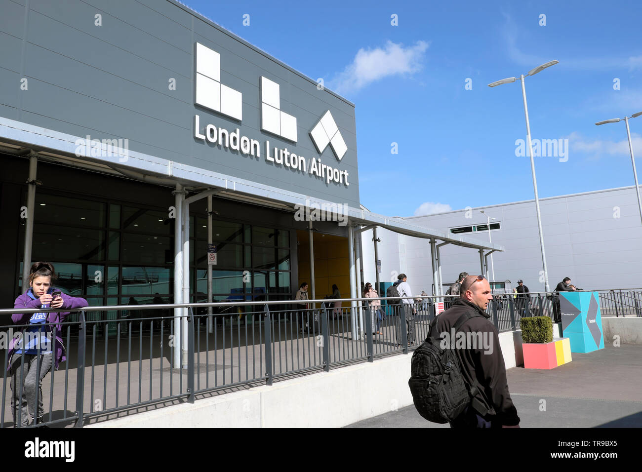 Exterior view of people travellers outside London Luton Airport ...