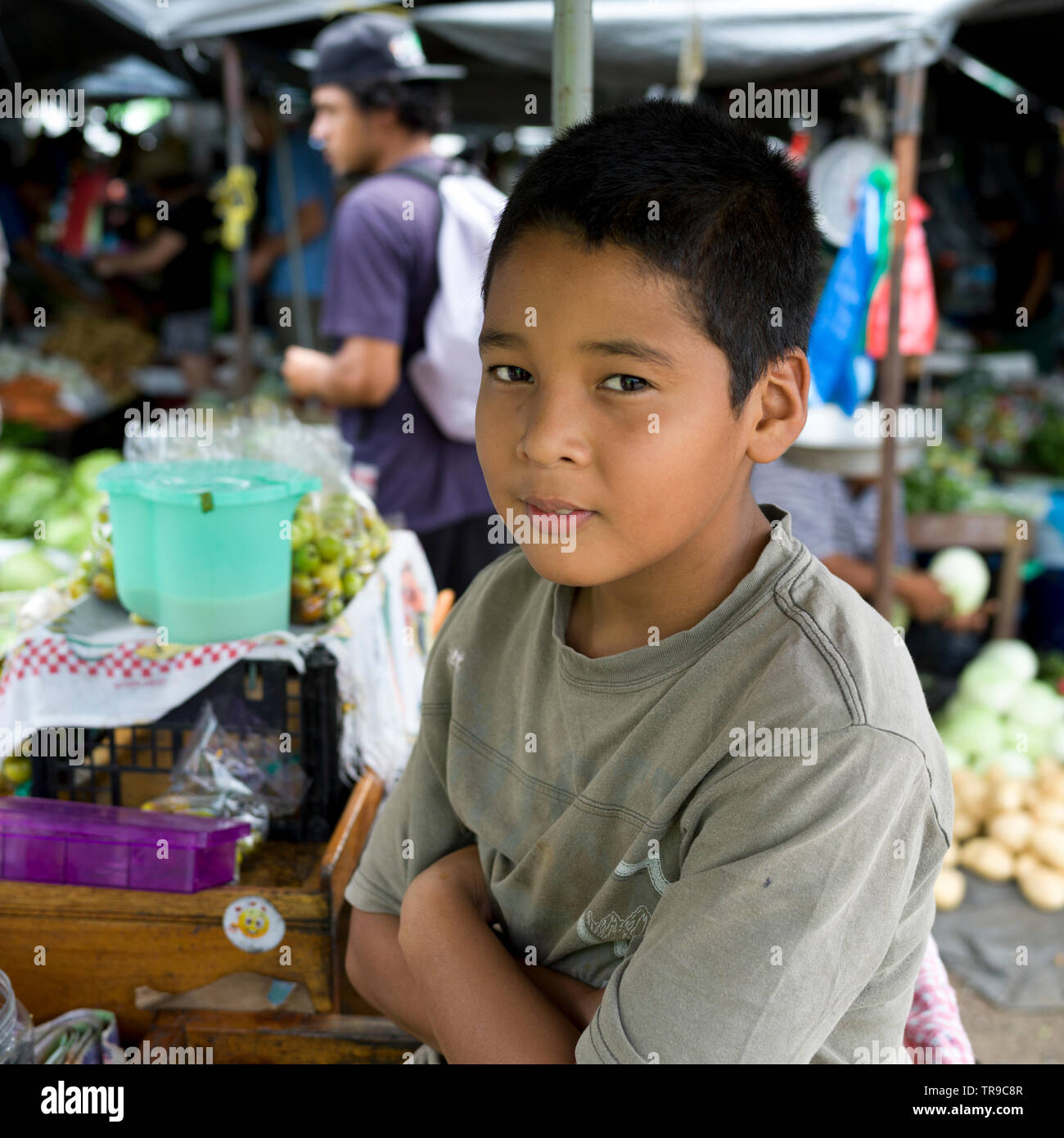Portrait of boy in farmer's market, San Ignacio, Belize Stock Photo - Alamy