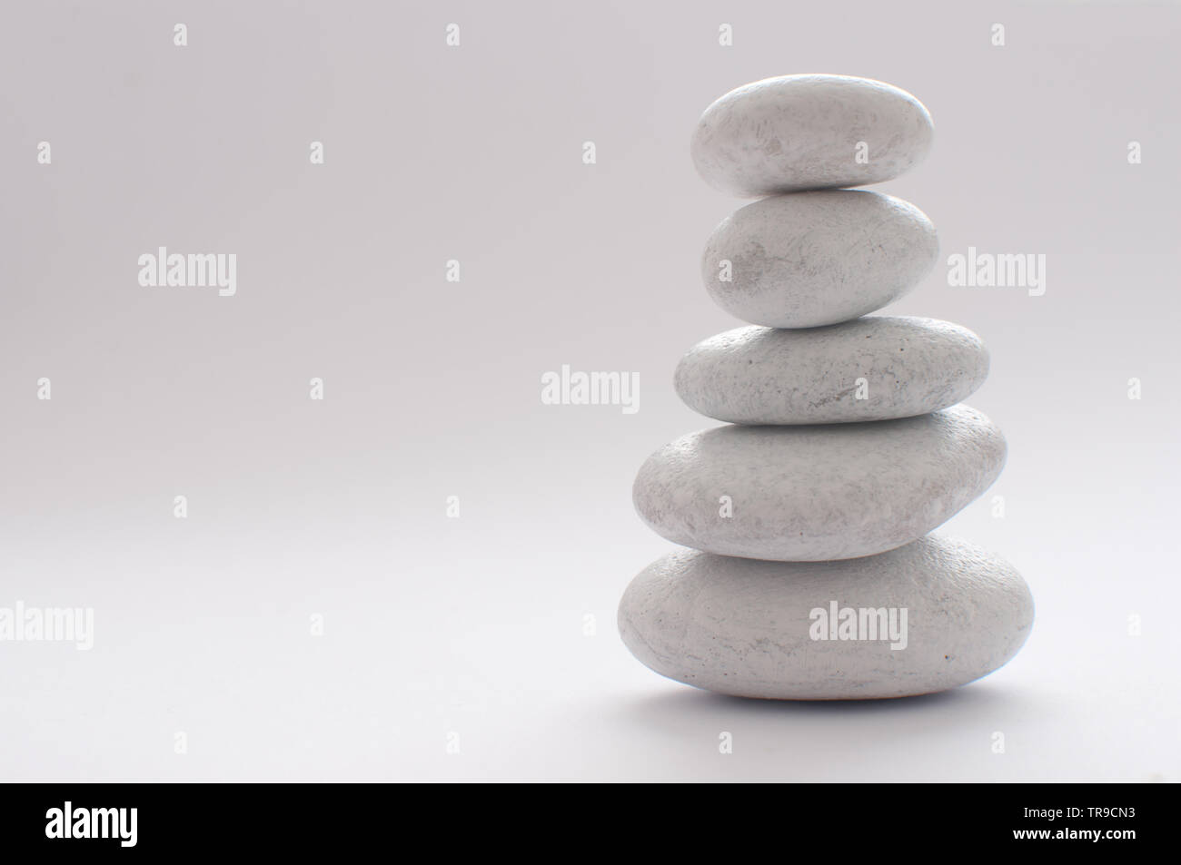 Yoga zen stones balancing on top of each other Stock Photo - Alamy