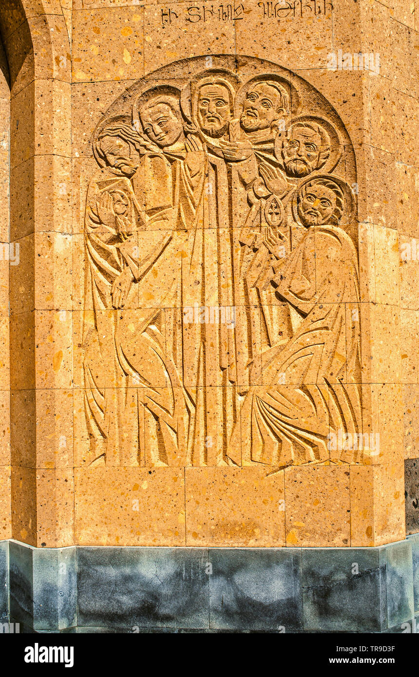Images of Holy Martyrs are carved on the wall of the oval portal at the ...