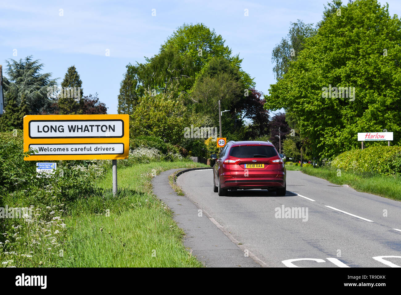 long whatton village sign leicestershire Stock Photo - Alamy