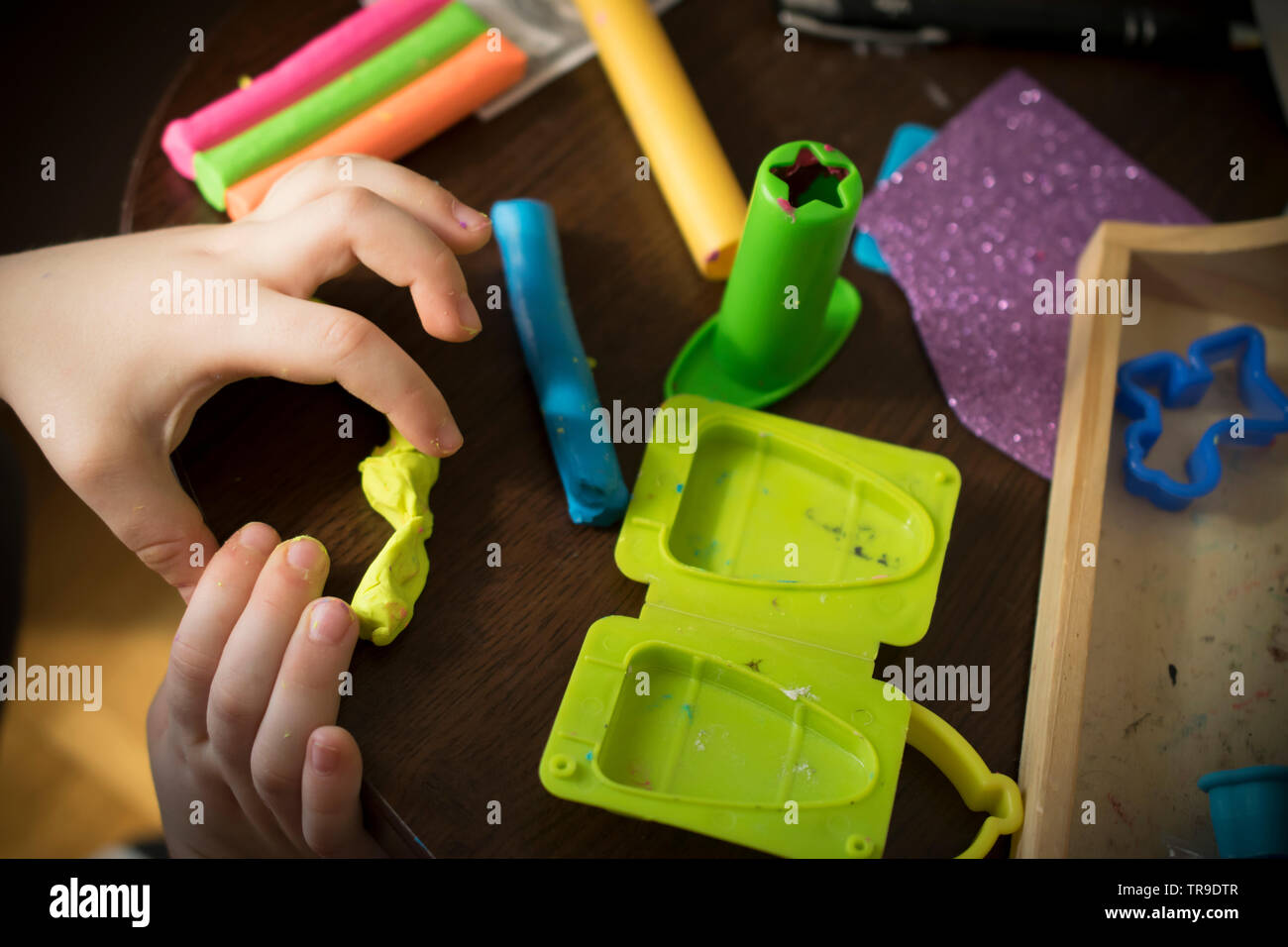 Children playing with hand made toys hi-res stock photography and ...