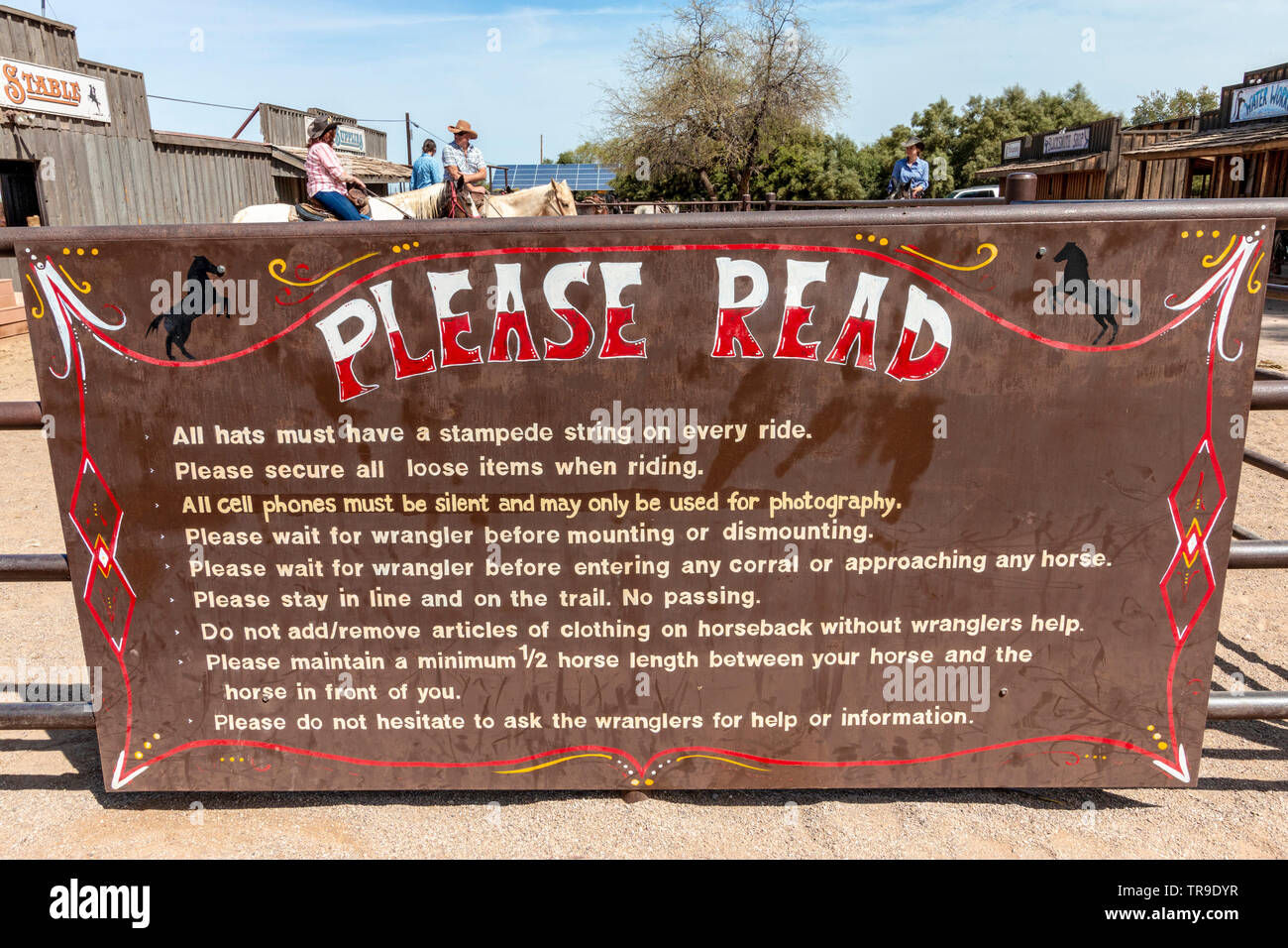 Signs near the horse corral at White Stallion Ranch, a dude ranch just ...