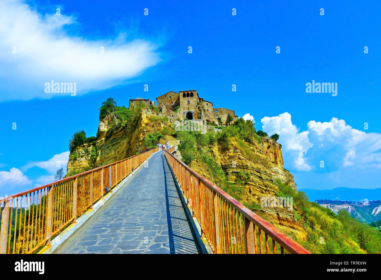 View of Civita village located on a hill and connected with Bagnoregio ...