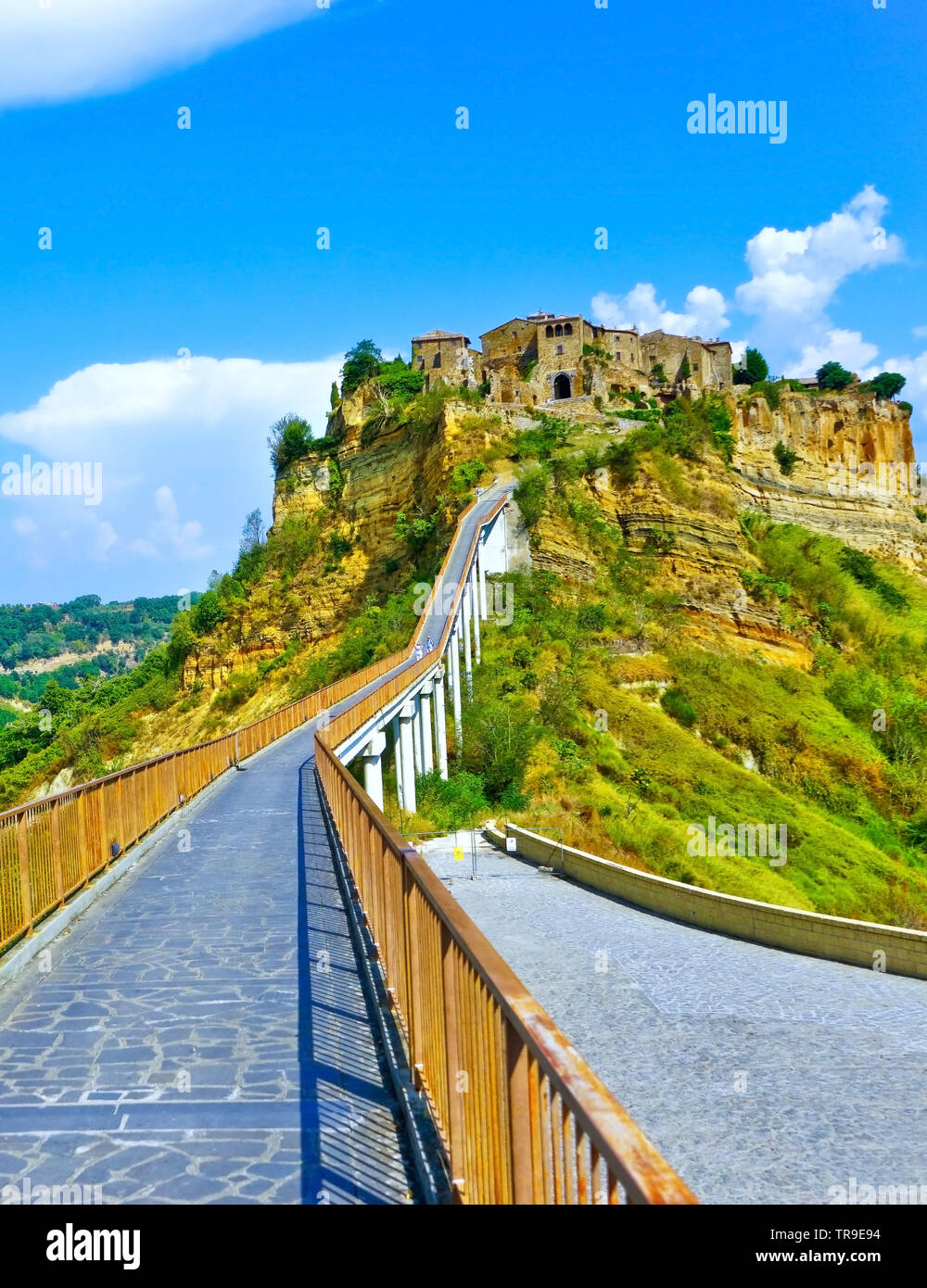 View of Civita village located on a hill and connected with Bagnoregio ...