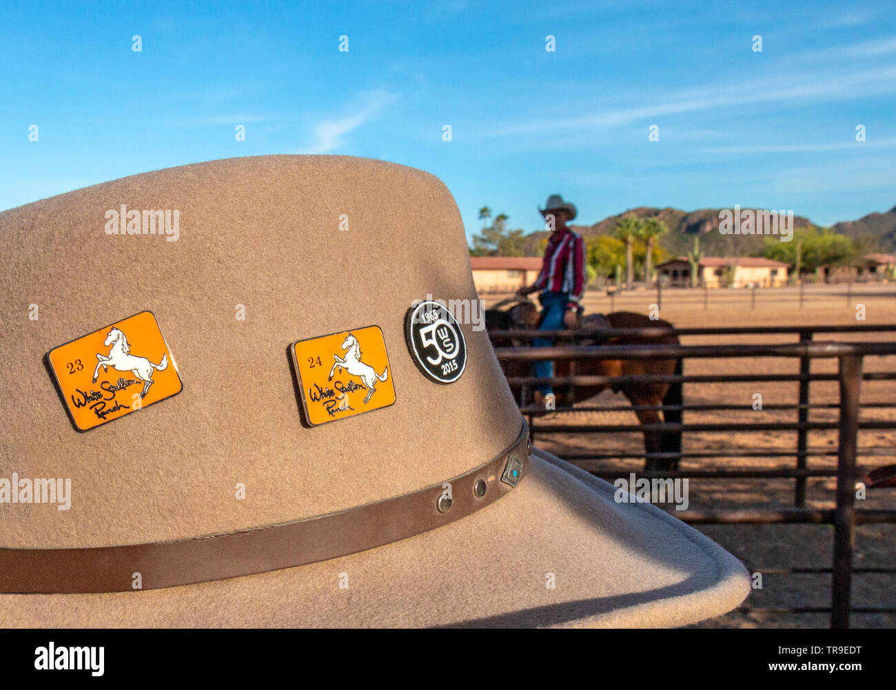 Pins on a hat signify how many visits a guest has made to White ...