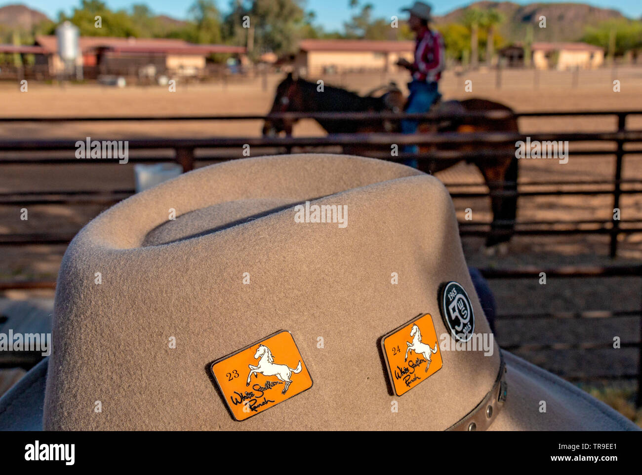 Pins on a hat signify how many visits a guest has made to White ...