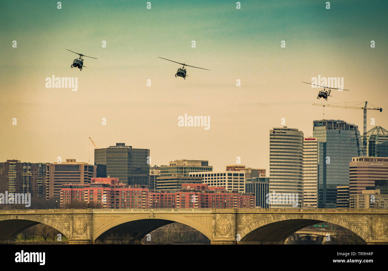 Three Presidential helicopters fly over Key Bridge in Washington, DC ...