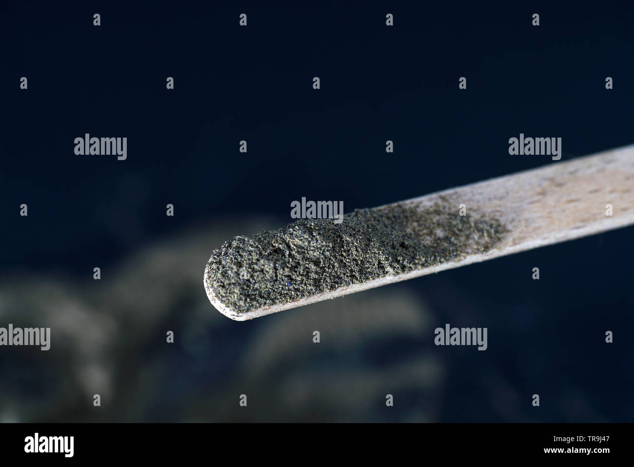 Potassium is a chemical element and was photographed here with a dark ...