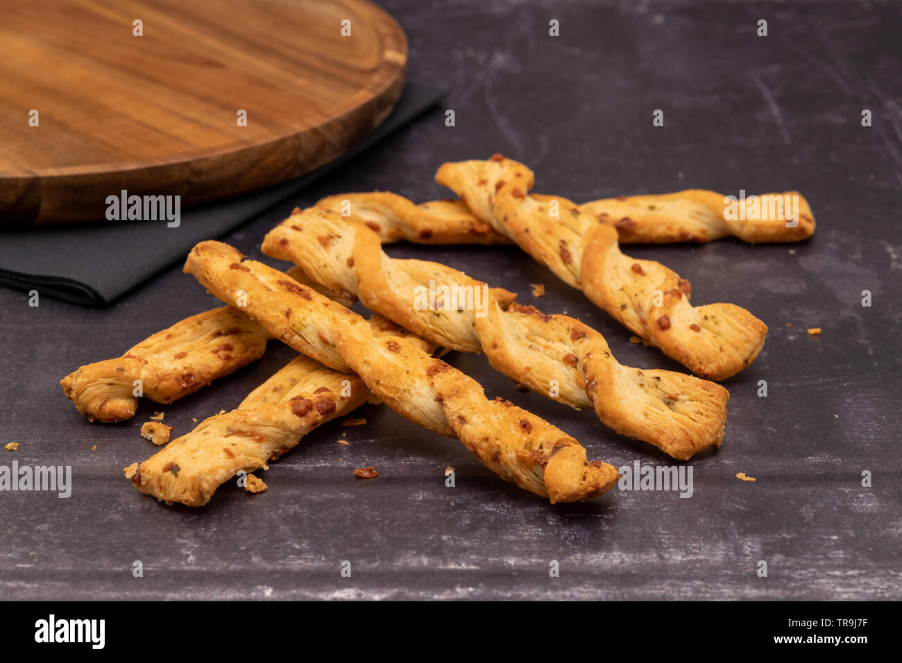 Puff pastry cheese sticks or straws Stock Photo - Alamy