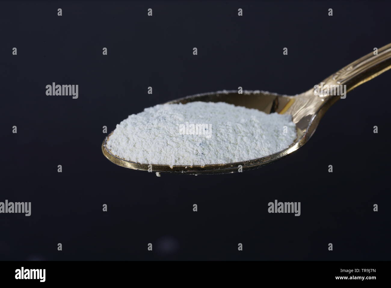 Potassium is a chemical element and was photographed here with a dark ...