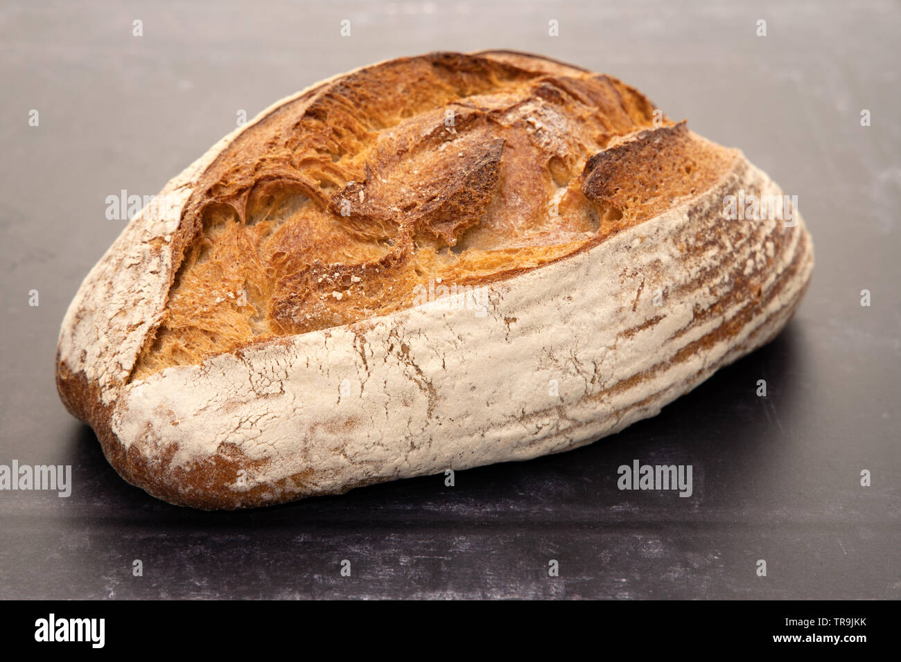 A loaf of artisan sourdough bread Stock Photo - Alamy