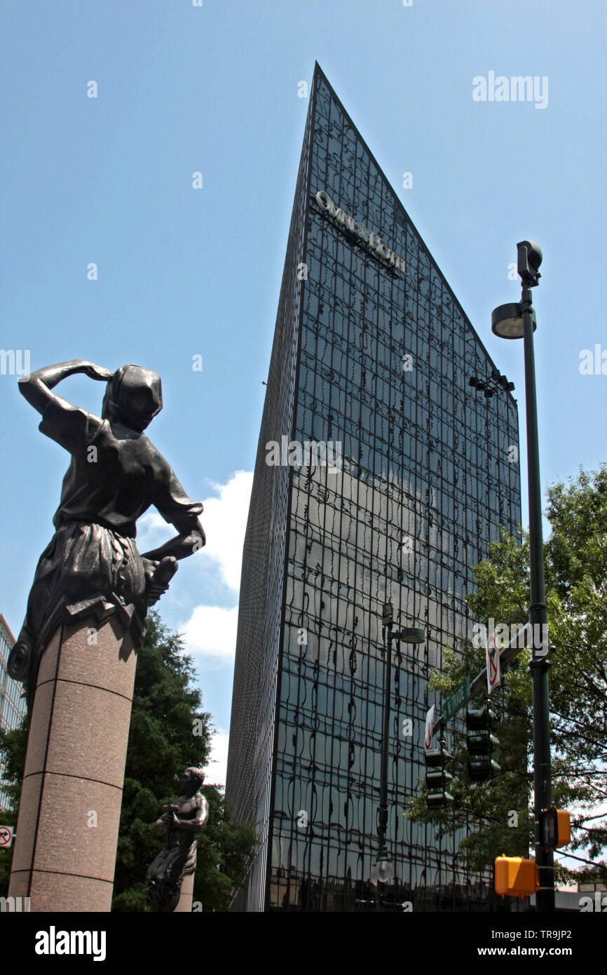 The "Industry" statue and the Omni Hotel in the Independence Plaza in ...
