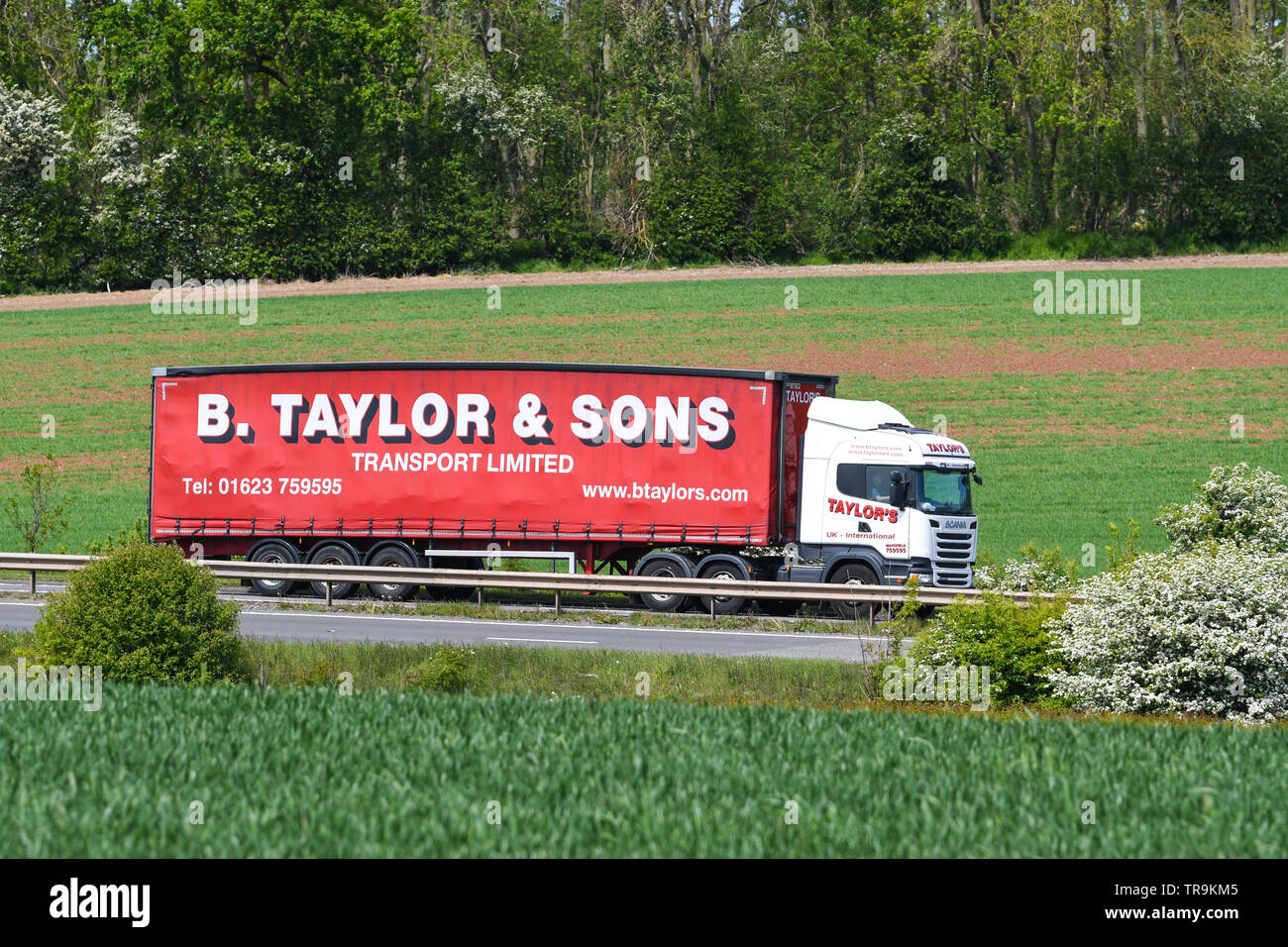 lorries travelling on the a42 in leicestershire Stock Photo - Alamy