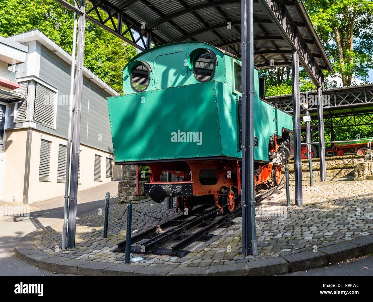 An old, historic steam locomotive standing on a closed track Stock ...
