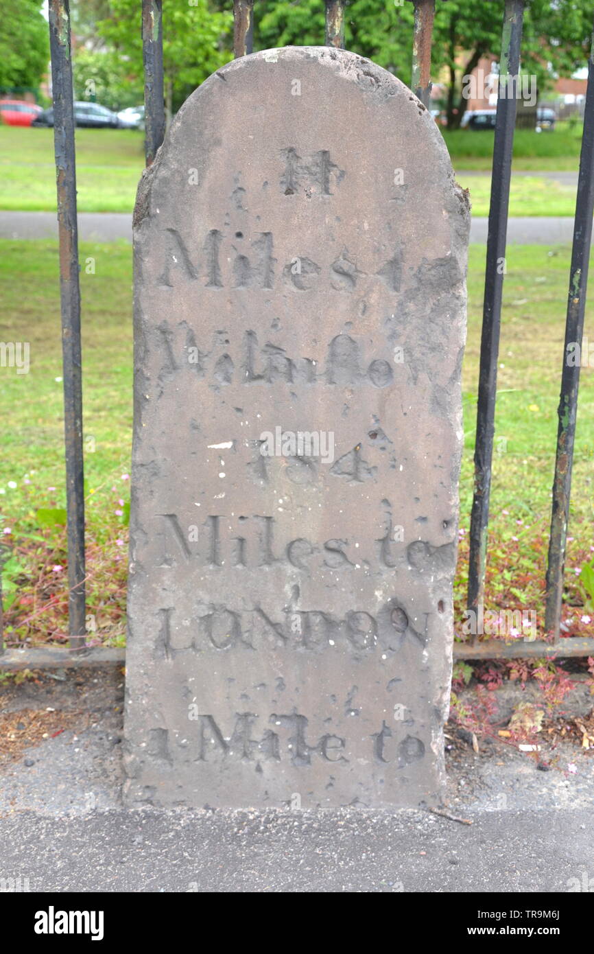 Old milestone showing the distance from Manchester to London on Ardwick ...