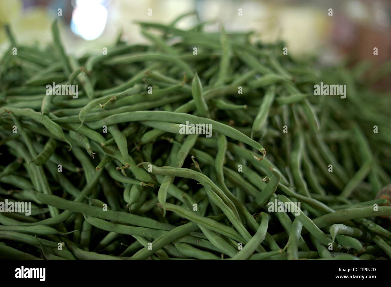 Pile of Fresh organic green runner beans at Traditional Market Stock ...
