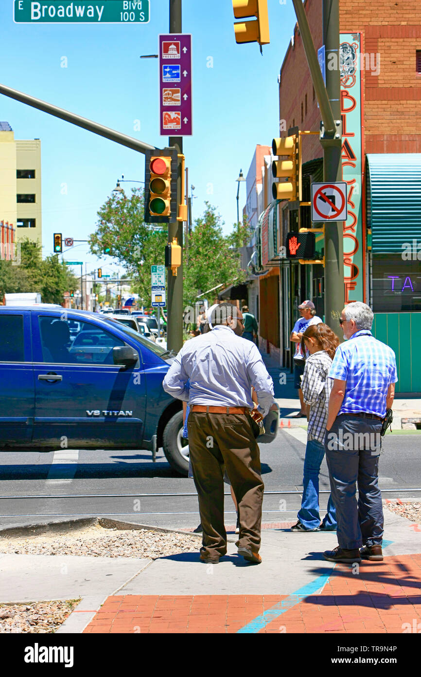 People waiting at the crosswalk on the corner of 6th and Broadway in ...