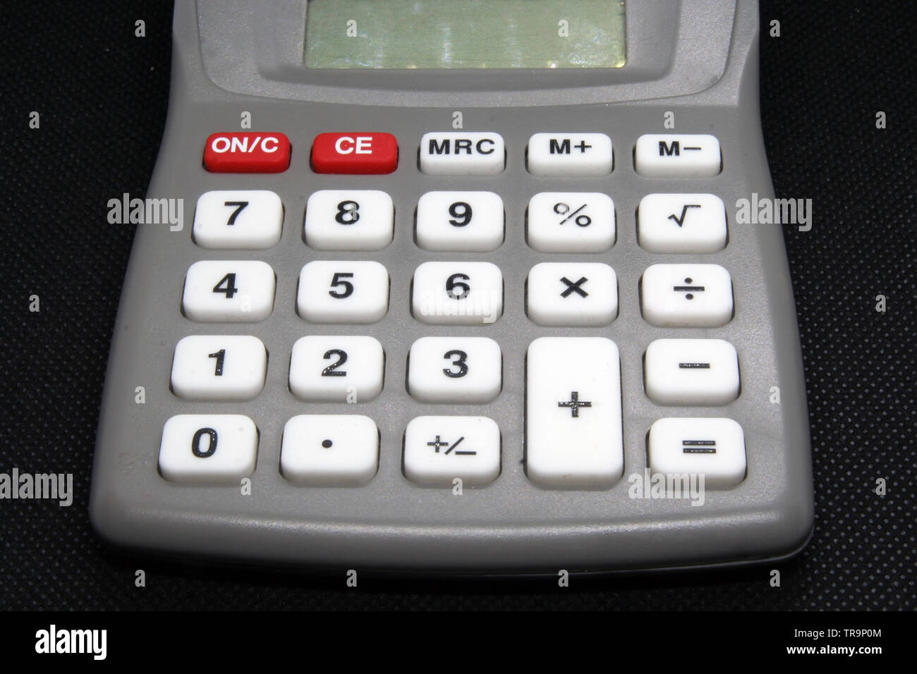 Calculating with calculator hi-res stock photography and images - Alamy