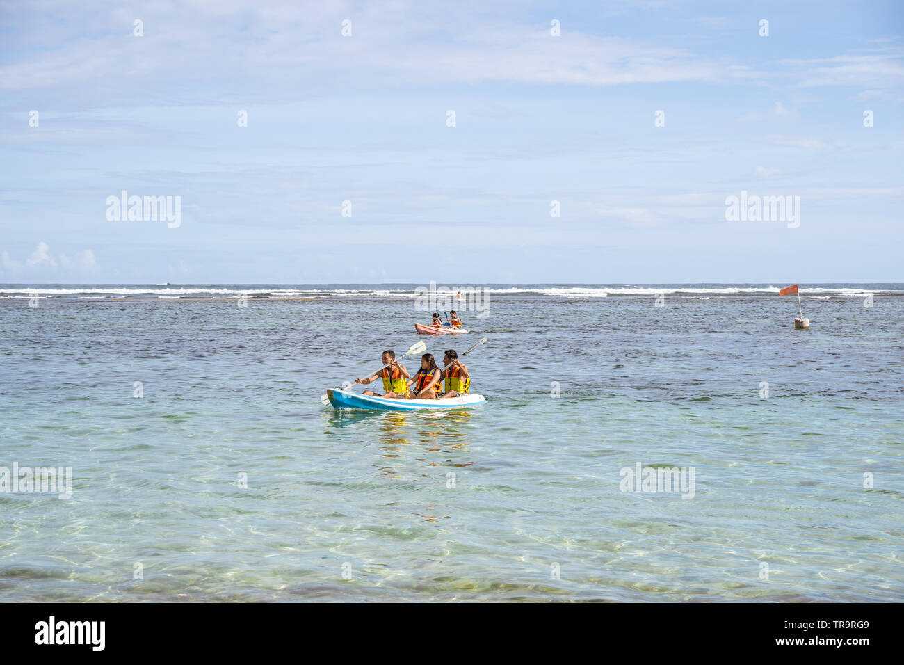Indonesian nationals tourists enjoying kayaking at Pandawa beach, Bali ...