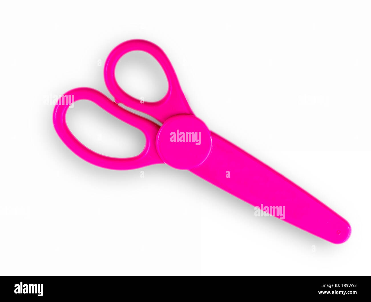 Pink baby scissors cut out on a white background. View from above Stock ...