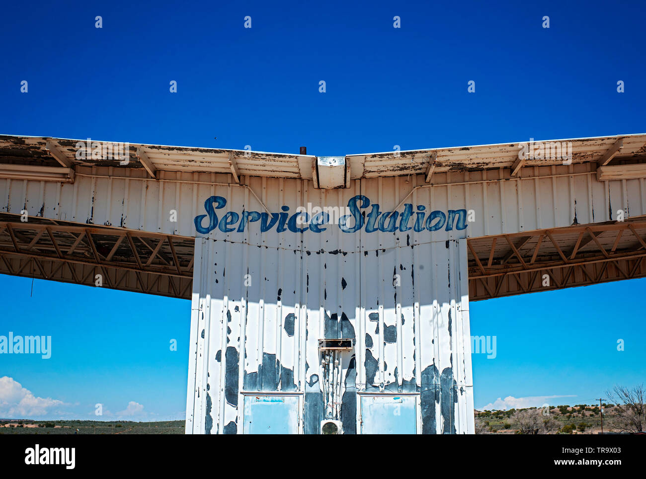 SERVICE STATION SIGN AND BUILDING CIRCA 1950 WITH CRUMBLING PAINT AND ...