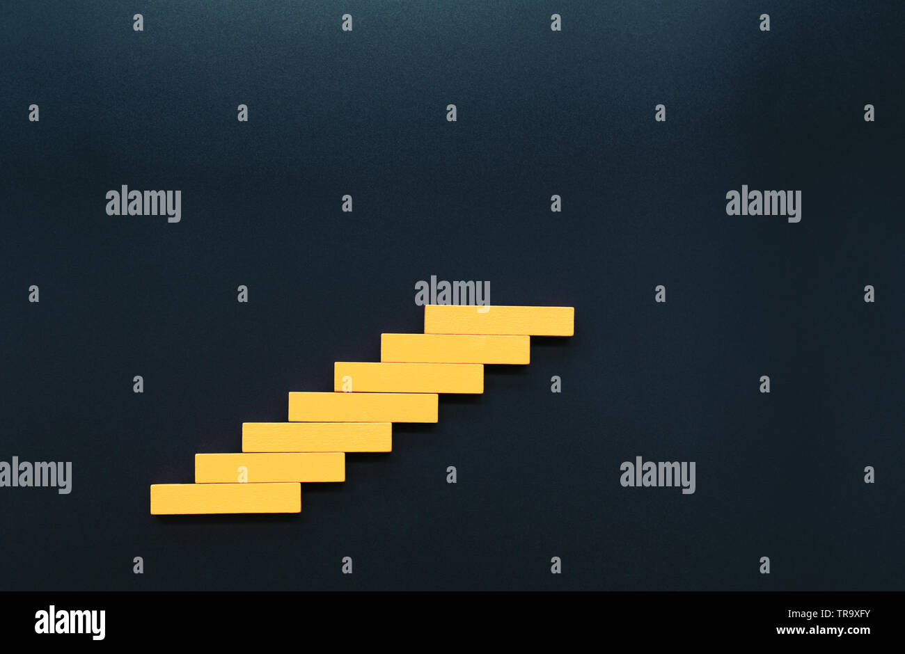 Wooden block stacking as step staircase. Business concept for growth ...