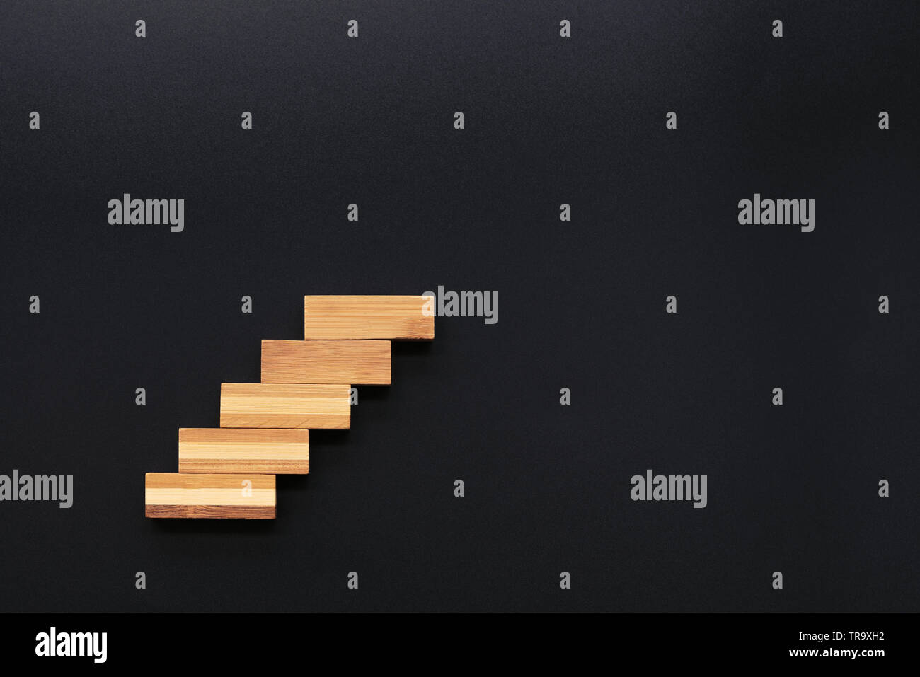 Wooden block stacking as step staircase. Business concept for growth ...