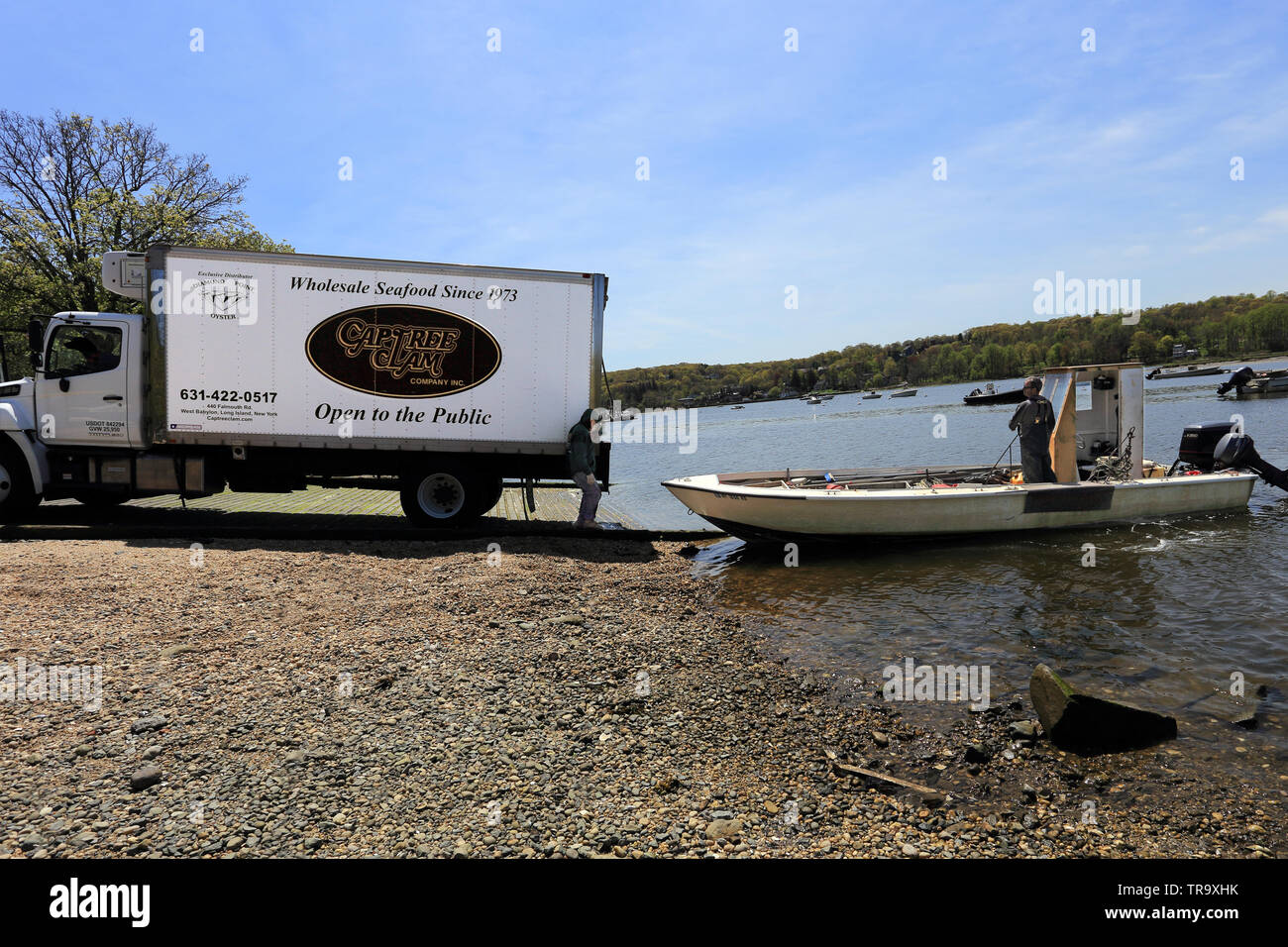 Clam boat hi-res stock photography and images - Alamy