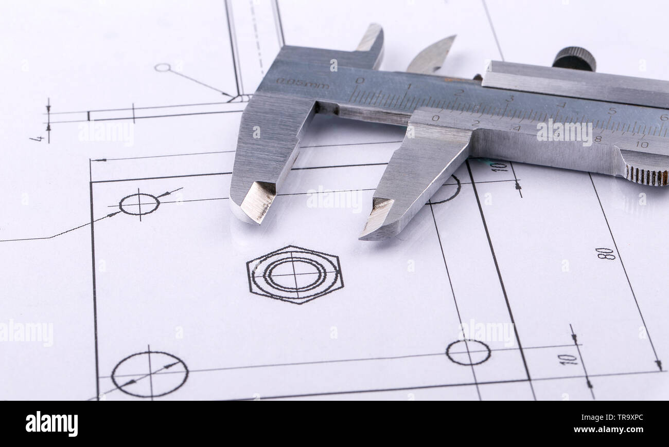 Old metal caliper and engineering drawing Stock Photo - Alamy