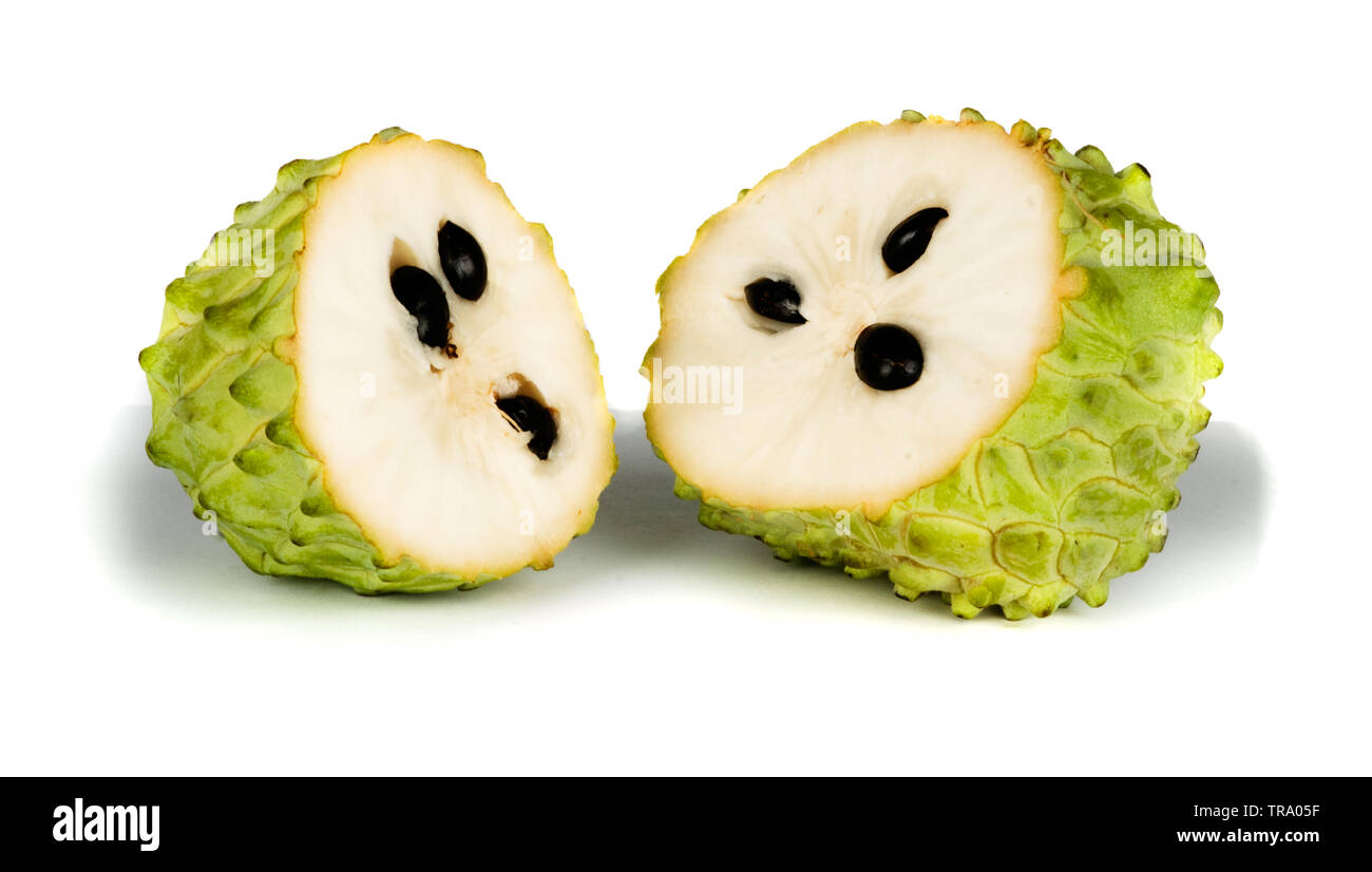 Soursop sections isolated on white background Stock Photo - Alamy