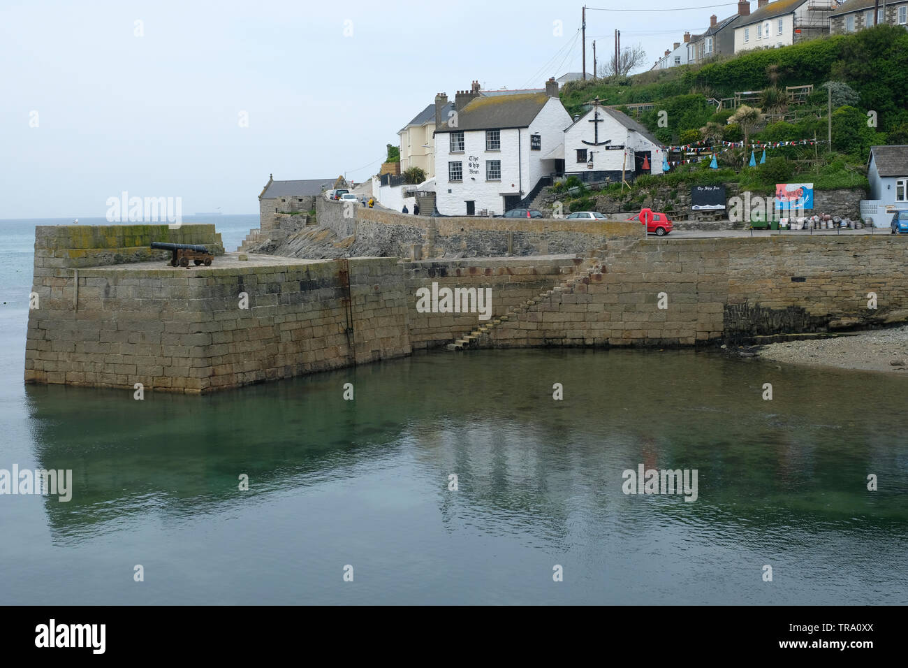 The Ship Inn at the entrance to Porthleven harbour in Cornwall Stock ...