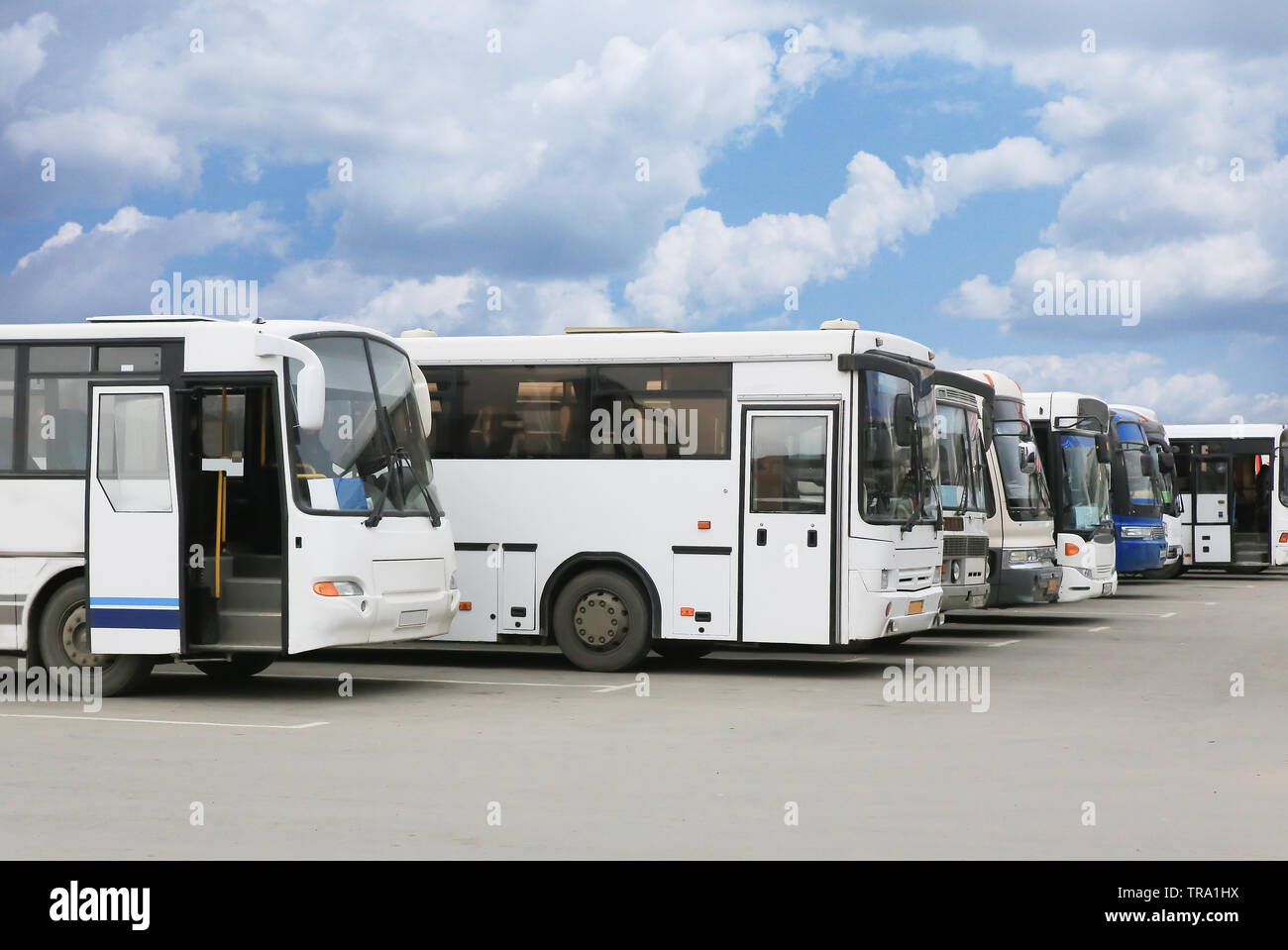 big tourist buses on parking Stock Photo - Alamy