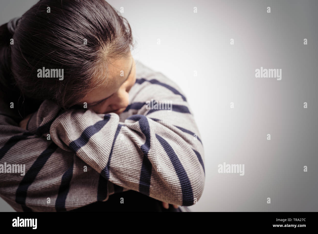 Woman crying alone dark room hi-res stock photography and images - Alamy