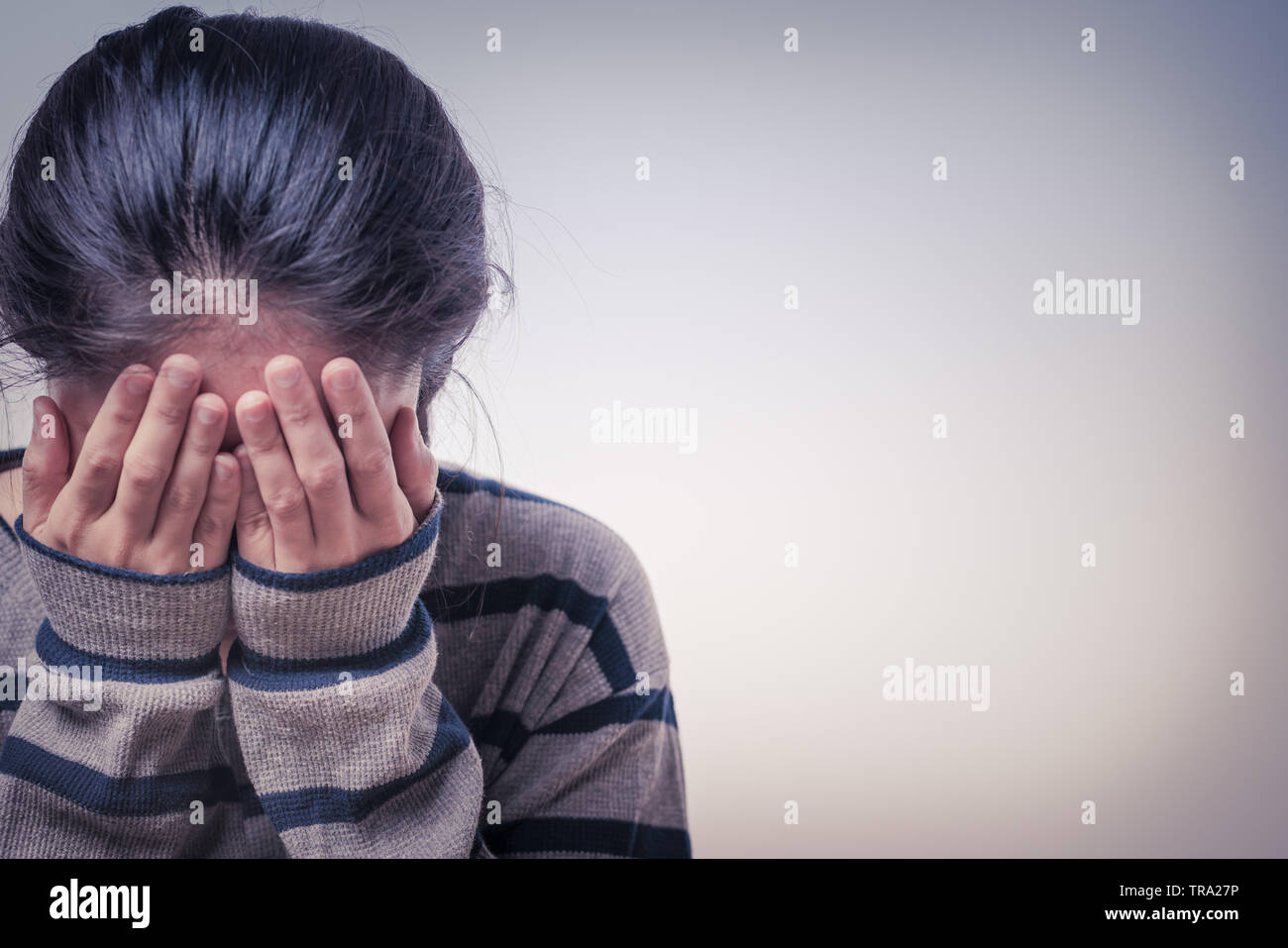 Woman crying alone dark room hi-res stock photography and images - Alamy