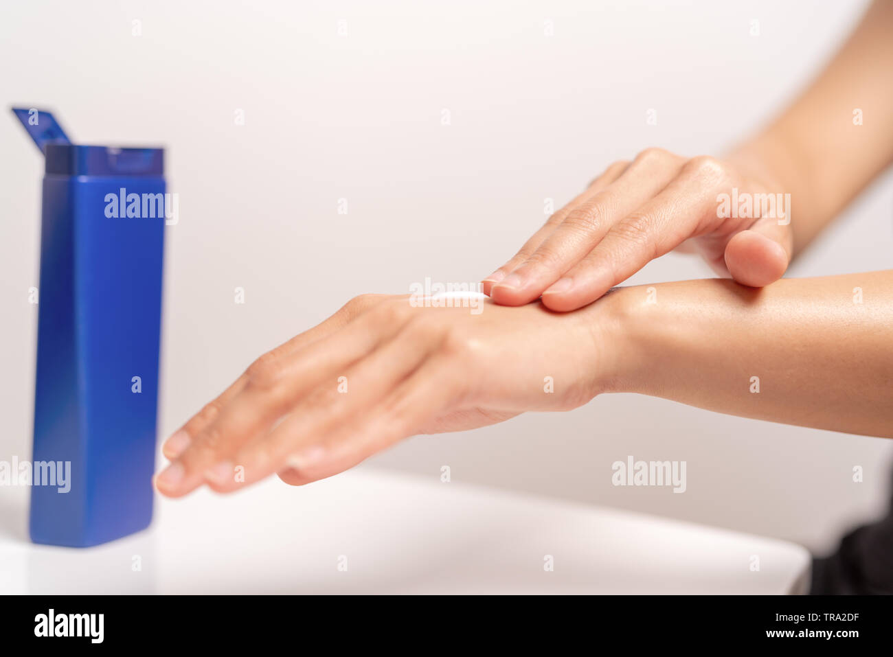 UV Protection Body Lotion Skin Care Apply. women hands holding UV ...