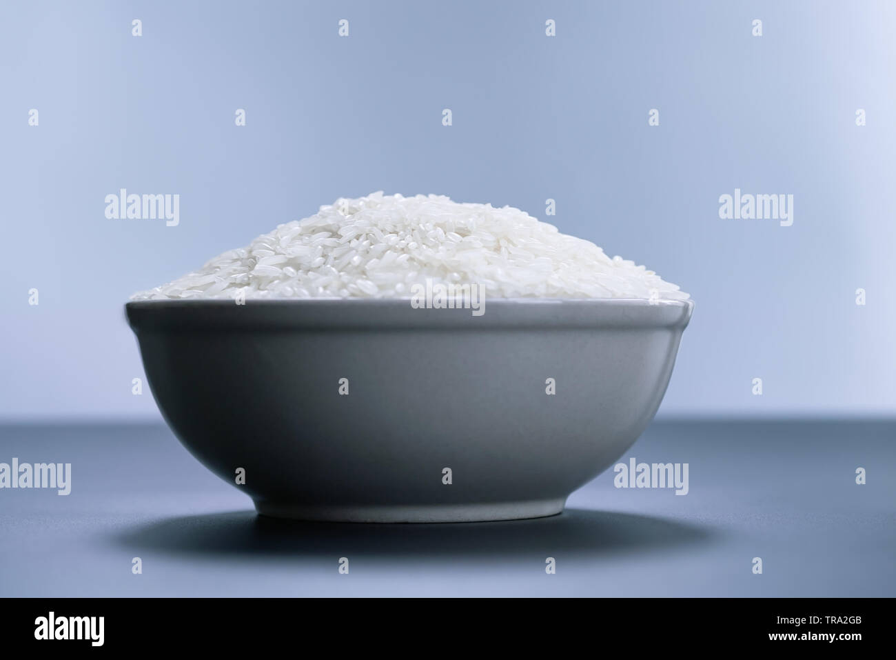 bowl of jasmine white rice on black backgrounds Stock Photo - Alamy