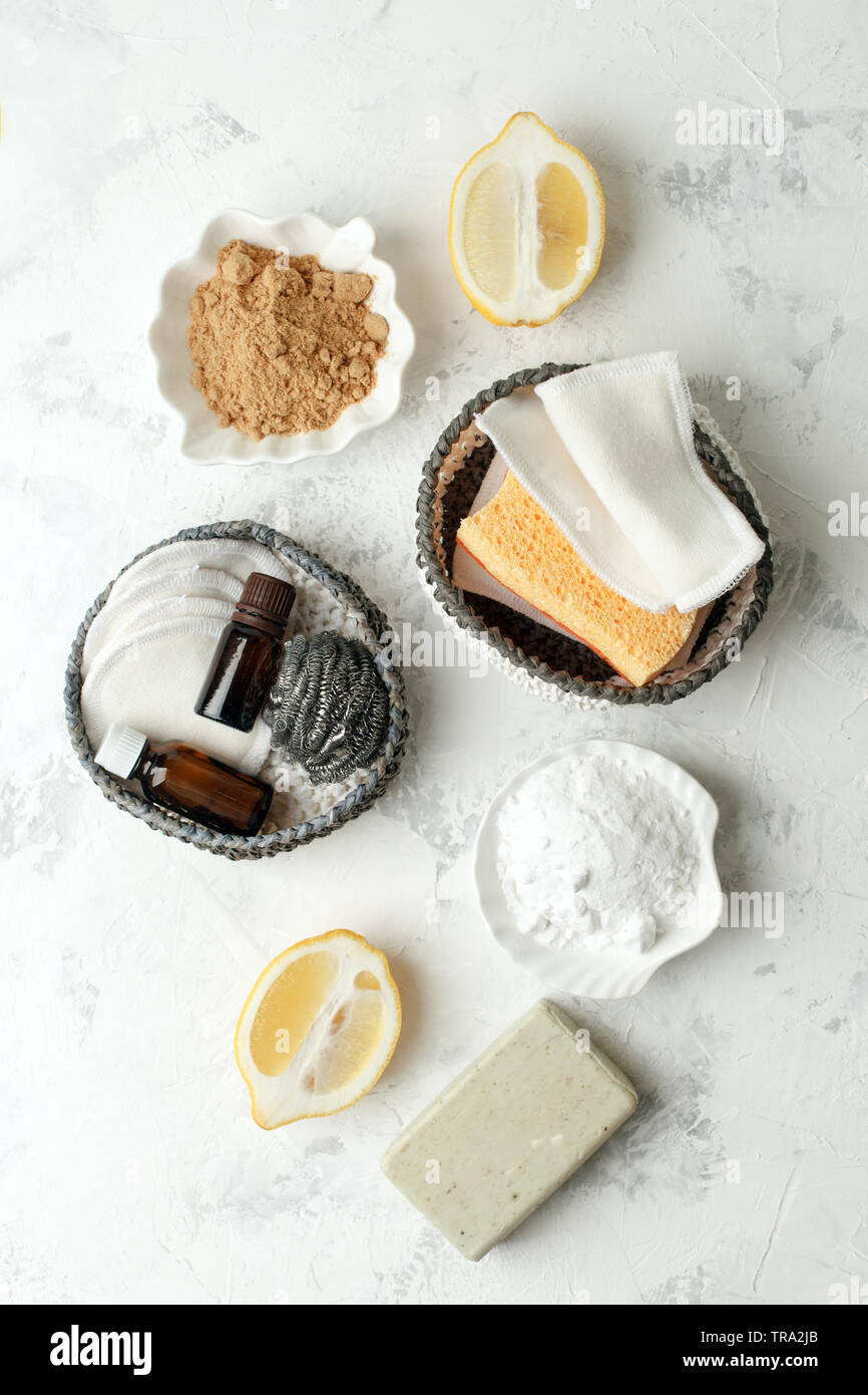 set of eco-friendly natural cleaning products on wooden kitchen table ...