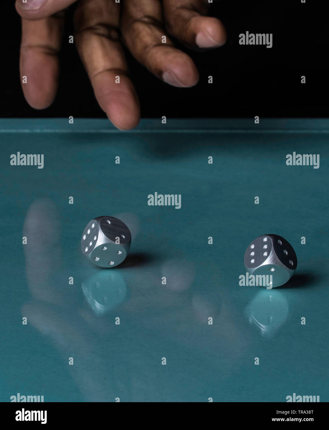 Hand in throwing dice hi-res stock photography and images - Alamy