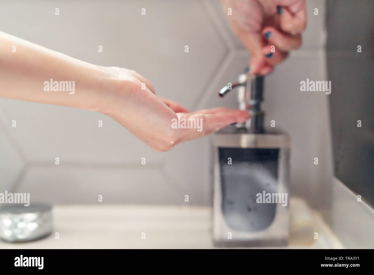 women washing hand with liquid soap in restroom Stock Photo - Alamy