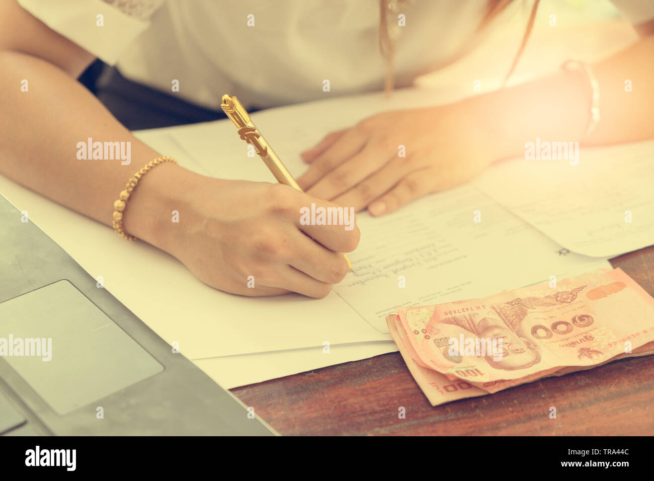 Signature model on white paper and on table Stock Photo - Alamy