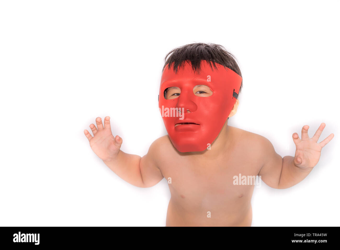 Kid wear red mask on white background Stock Photo - Alamy